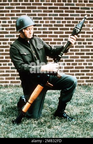 A Soviet RPG-7 portable rocket launcher in firing position. Country ...