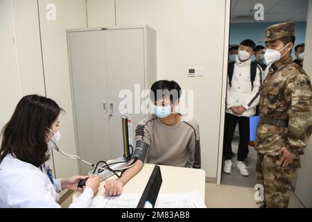 FUYANG, CHINA - JANUARY 12, 2023 - 200 college graduates take part in a ...