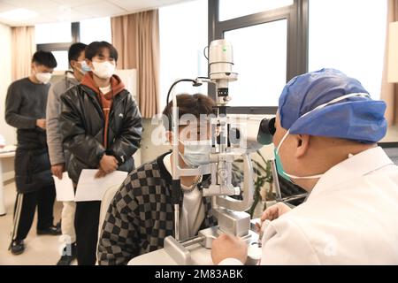 FUYANG, CHINA - JANUARY 12, 2023 - 200 college graduates take part in a ...