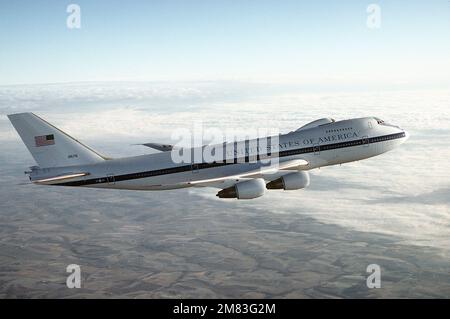 An air-to-air right side view of an E-4B advanced airborne national c ...