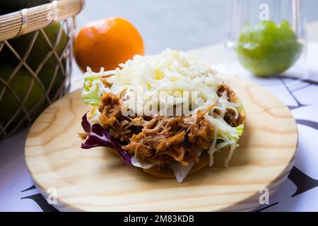 Patacón with pulled pork breakfast. The patacón, tostón, tachino or ...