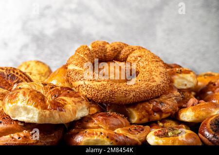 Bagel and pogaca varieties. They eat pastries in piles. Bakery products ...