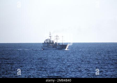 The East German intelligence ship JASMUND passes to starboard of the ...