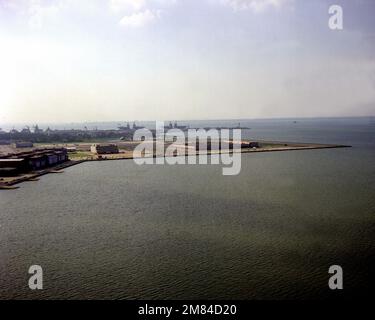 An aerial view of piers 11 and 12 at the Naval Station. On the left is ...