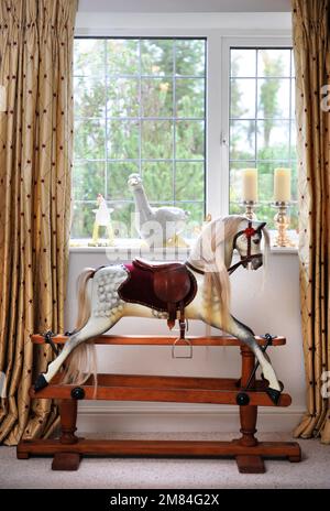 Golden rocking horse Stock Photo - Alamy