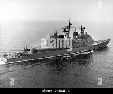 An elevated starboard quarter view of the guided missile destroyer USS ...