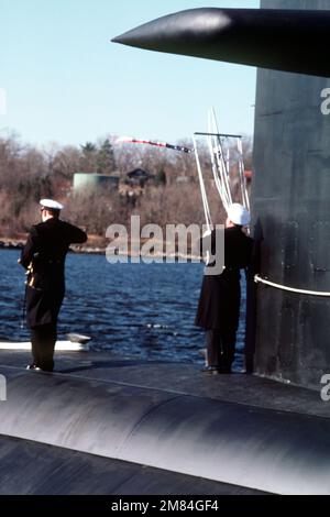 The commissioning pennant is raised aboard the nuclear-powered attack ...