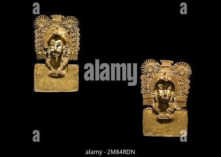 A solid gold pectoral of the Mixtec deity Coo Dzavui or Rain Serpent ...