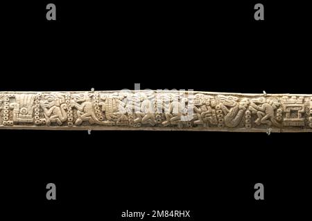Bone with carved figures used for ritual purposes. Museum of Cultures ...