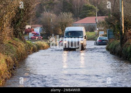 A car is seen abandoned in flood water under the Metro bridge at ...