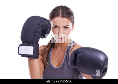Shes ready for a fight. Portrait of an attractive young female boxer ...
