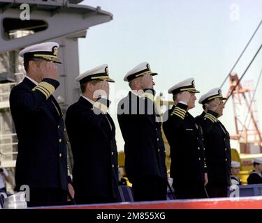 Rear Adm. (lower half) Thomas A. Mercer poses for photo with his family ...