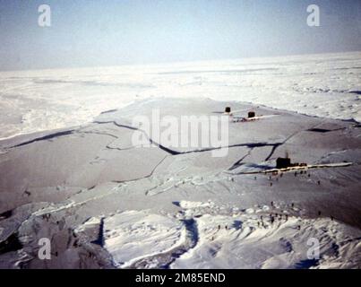 An elevated view of the attack submarines USS RAY (SSN-653), USS ...