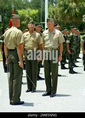 General Robert H. Barrow, Commandant of the Marine Corps, prepares to ...