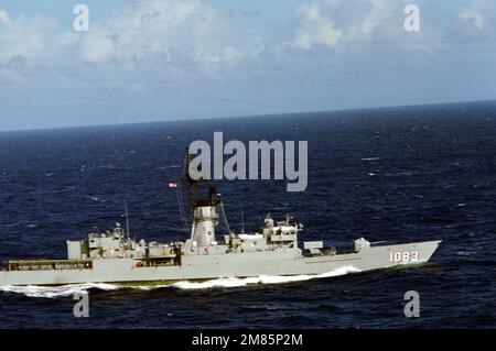 The frigate USS COOK (FF-1083) is moored alongside the fast combat ...