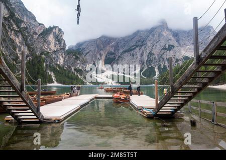 Ladders down to the jetty to hire boats at Lago di Braies in the ...