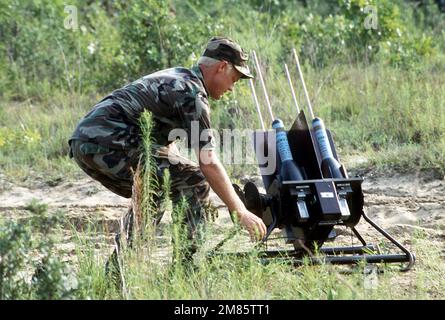 MASTER Sgt. Chester Davis, 16th Special Operations Squadron, sets up a ...