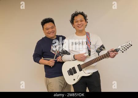 Portrait of singing duo Hz at TSQ, Causeway Bay. 21DEC22 SCMP / Jelly ...
