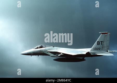 An air-to-air left side view of a 36th Tactical Fighter Wing F-15C ...