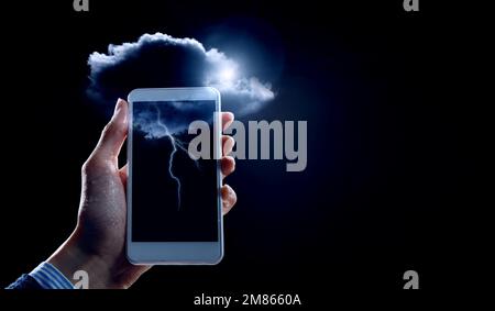 Thunderstorm with lightning on mobile phone screen Stock Photo - Alamy