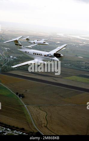 Air to air side view of Air Mobility Command's 375th Military Airlift ...