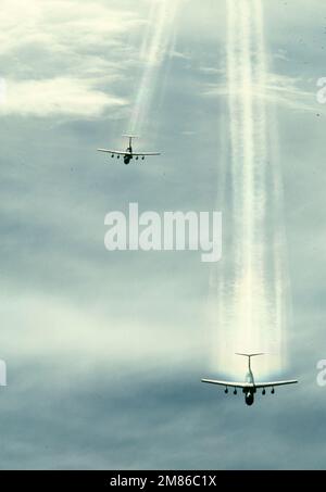 Air to air front view of a Air Mobility Command's 60th Military Airlift ...