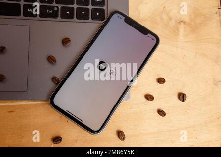 Kiev, Ukraine - January 12, 2023: the phone lies on a laptop with an ...