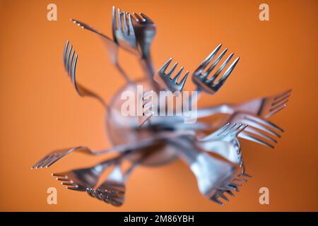 Creative composition with many forks Stock Photo - Alamy