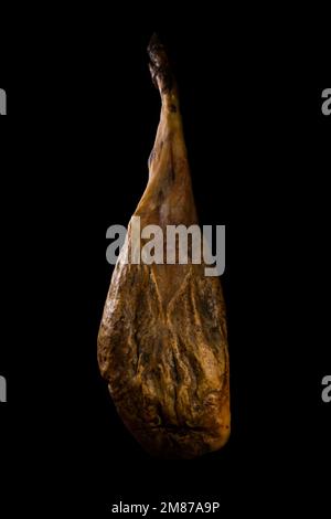 IIberian ham cutter on a black background Stock Photo - Alamy