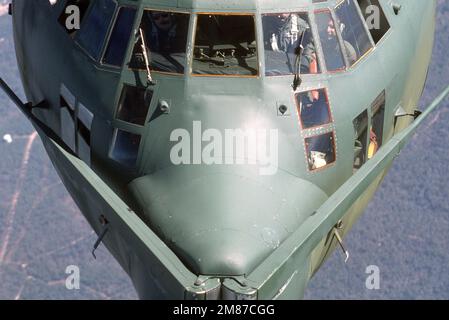 AN air-to-air view of an MC-130E Hercules aircraft flying low-level ...