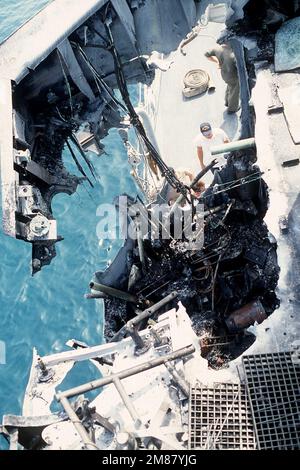 A close-up view of damage to the guided missile frigate USS STARK (FFG ...
