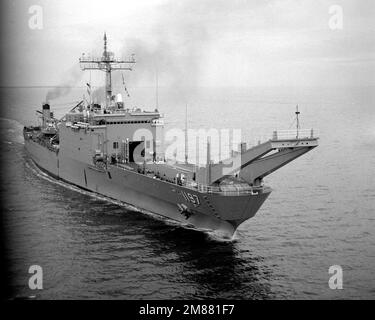 A starboard bow view of the tank landing ship USS HARLAN COUNTY (LST ...