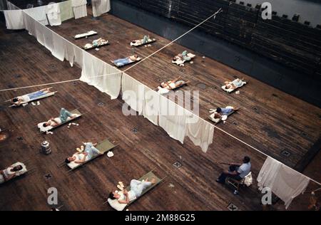 Detainees from the captured Iranian mine-laying ship IRAN AJR rest ...