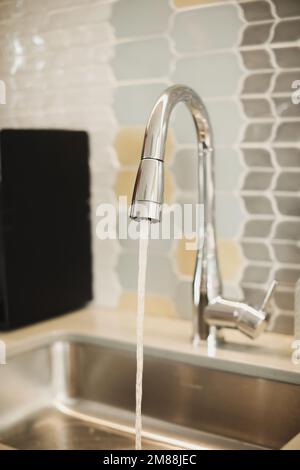water skin drain kitchen faucet wash plumbing Stock Photo - Alamy