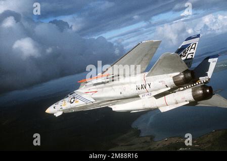 An air-to-air left underside view of an F-14A Tomcat aircraft before ...