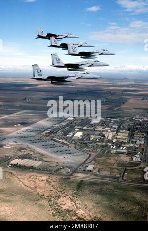 A right front view of an F-15 Eagle aircraft taxiing on the flight line ...