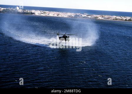 An MH-53H helicopter of the 1ST Special Operations Wing hovers over the ...