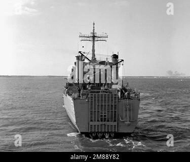 A view of the tank landing ship USS SAGINAW (LST-1188) lowering its ...