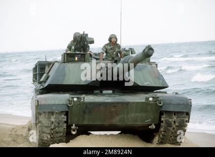 A Marine Corps M-1A1 Abrams main battle tank equipped with a mine ...