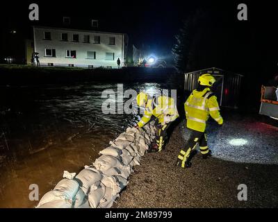 Halver, Germany. 12th Jan, 2023. The Volme flows just through the arch ...