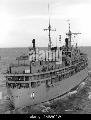 Starboard quarter view of submarine tender USS Gilmore (AS-16) in ...