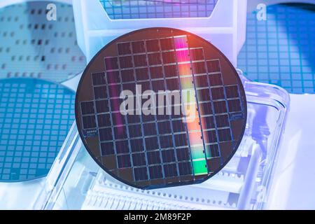 patterned silicon wafers in a universal pod. Electronic circuit designs ...