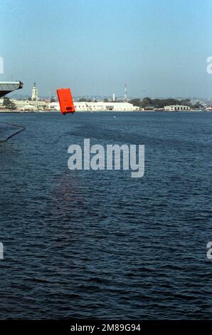 A 52,700-pound sled descends toward the water after being launched from ...