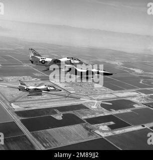 A right side view of three TA-7C Corsair II aircraft from Light Attack ...