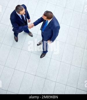 top view. handshake of modern business people Stock Photo - Alamy