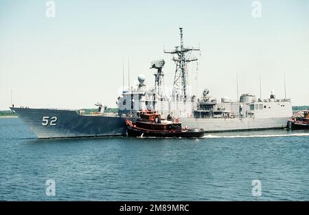 Harbor tugs maneuver the guided missile frigate USS STARK (FFG-31 ...