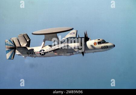 An air-to-air right side view of an E-2 Hawkeye airborne-early-warning ...