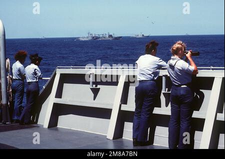 Crew members of the destroyer tender USS YELLOWSTONE (AD-41) enjoy a ...