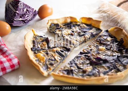Red cabbage French quiche. In gastronomy, a quiche is a type of savory ...