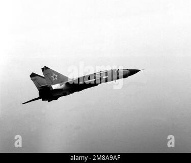 A right side view of a Soviet MiG-31 Foxhound fighter aircraft in ...